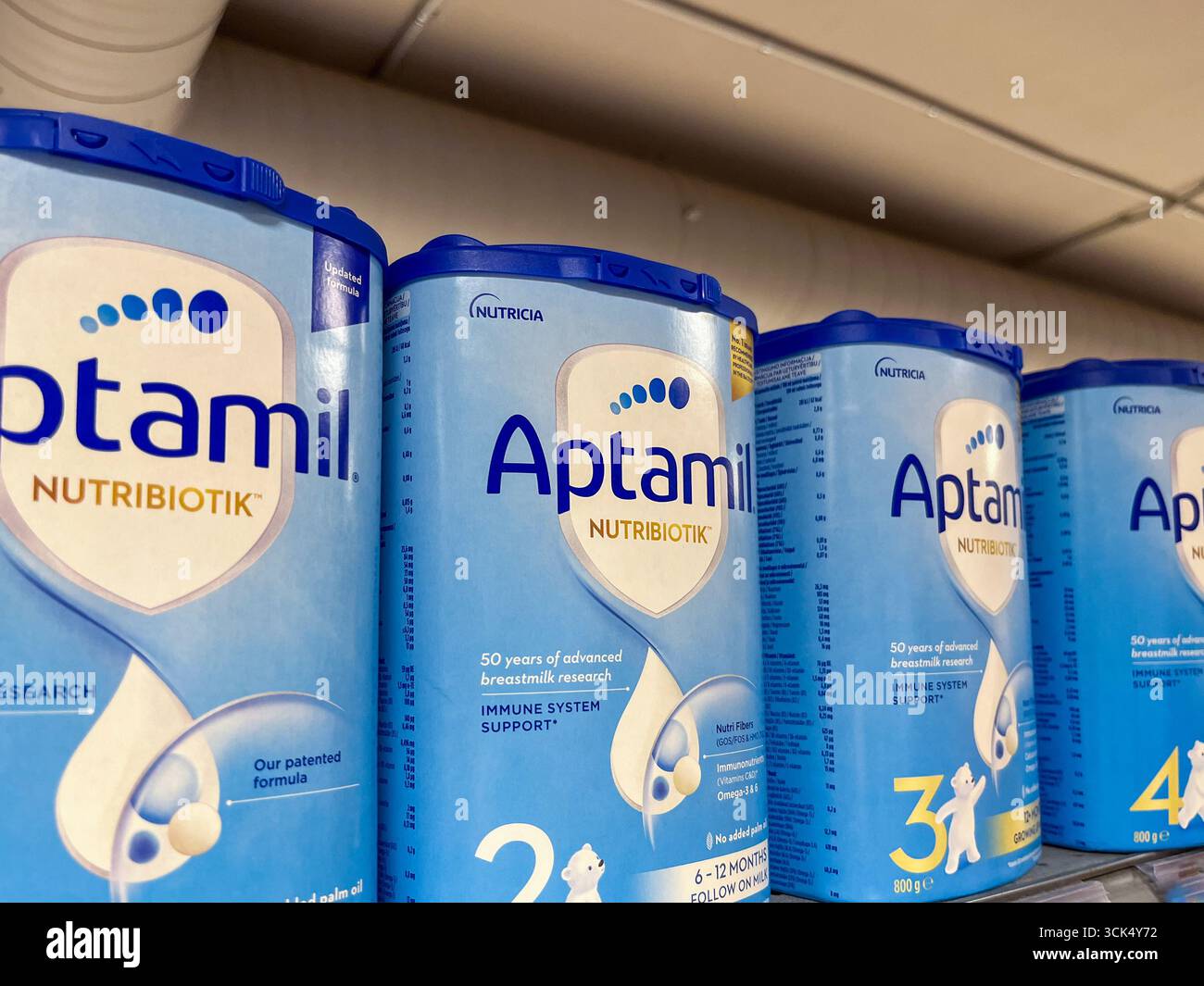 Riga, Latvia - September 04, 2025: Aptamil baby formula cans arranged ...