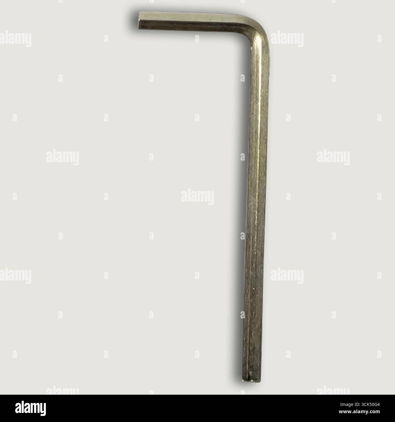 A metal L-shaped tool used for driving screws or bolts, commonly known ...