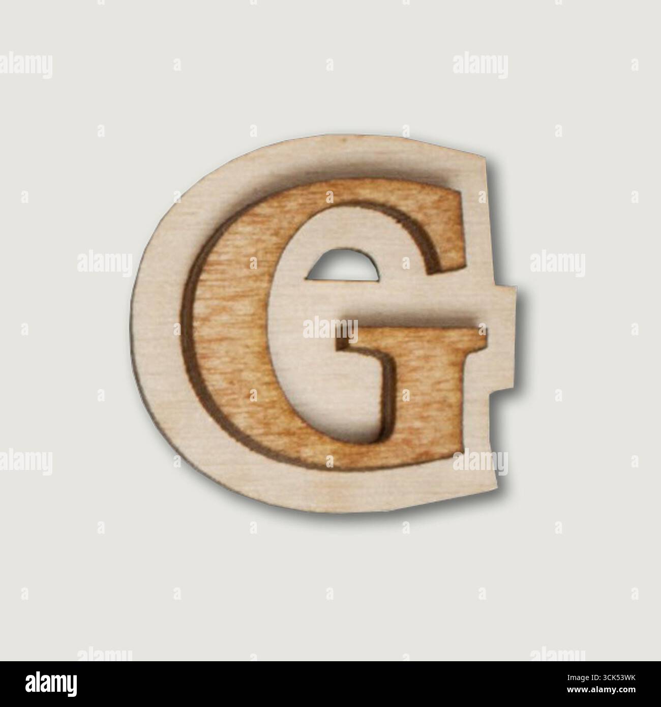 An unique concept of isolated wooden letters and number on plain ...