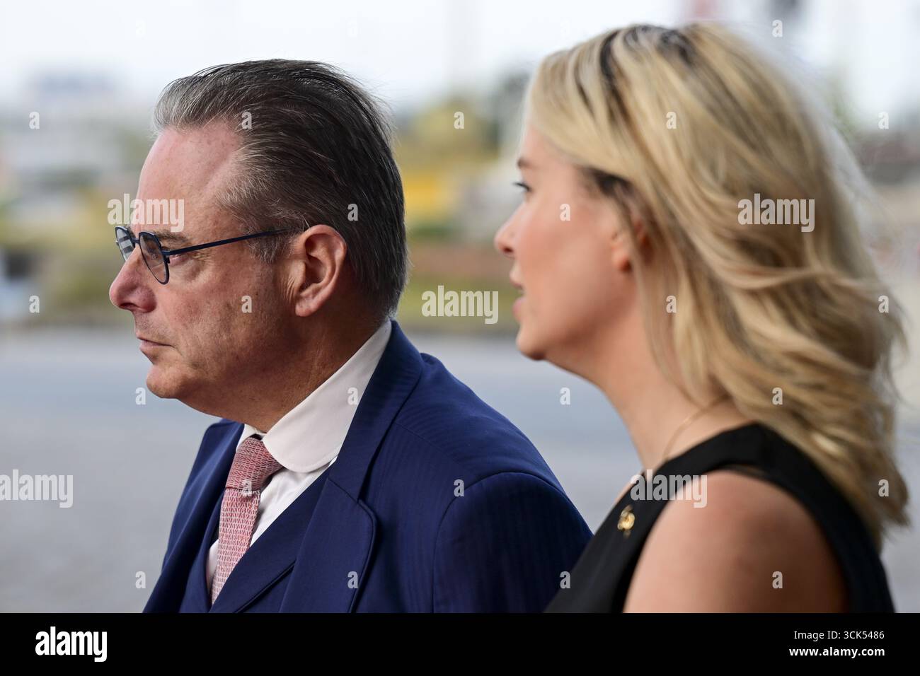 Prime Minister Bart De Wever and acting Antwerp mayor Els Van Doesburg ...