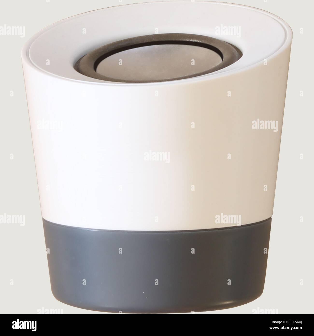 A modern, sleek trash bin designed for waste disposal in contemporary ...