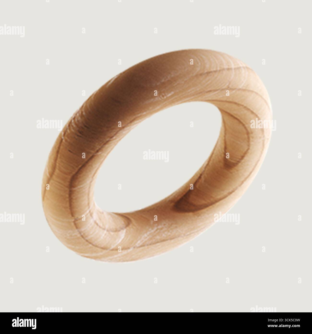 A smooth, wooden torus-shaped object, showcasing craftsmanship and ...