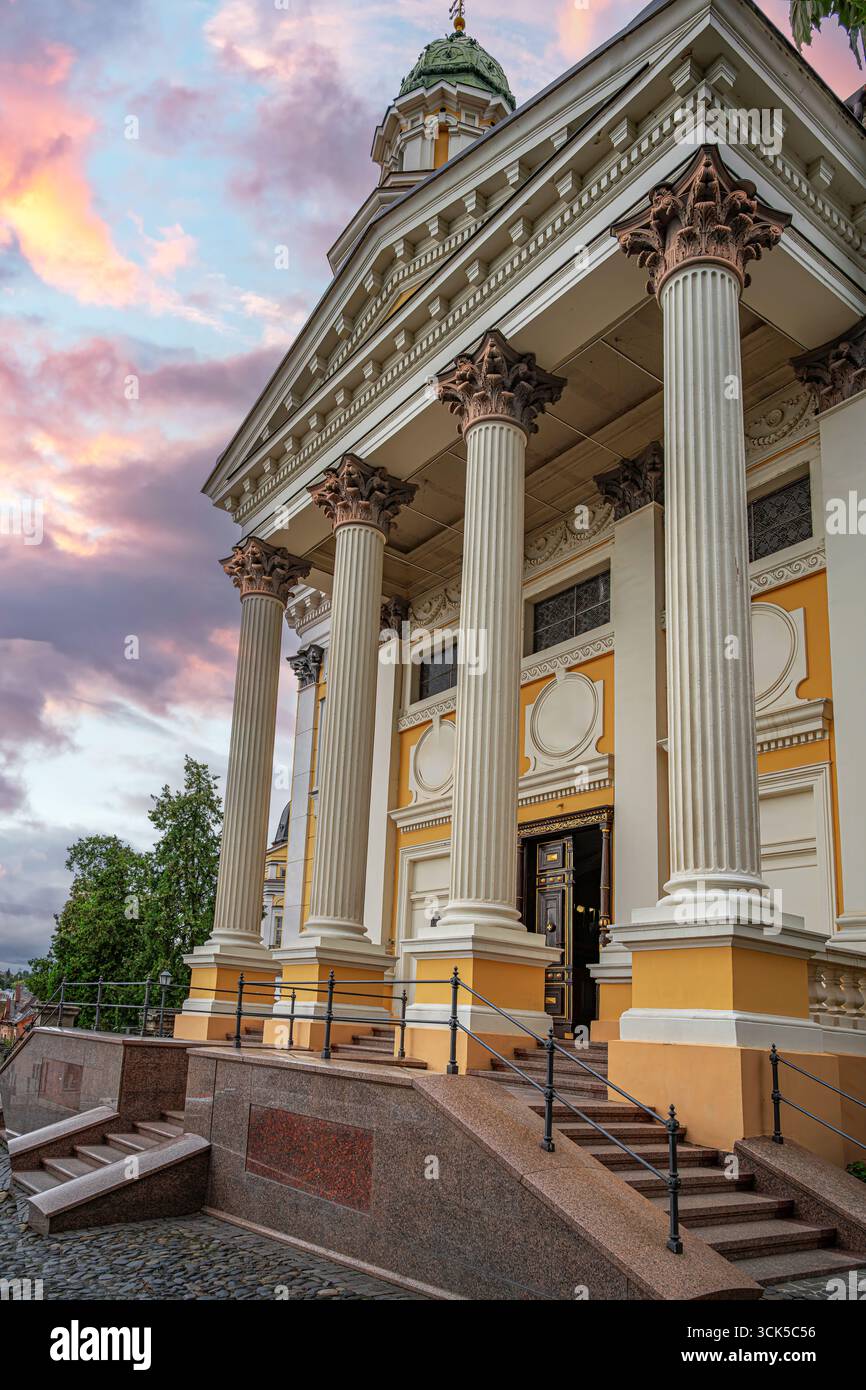 A grand neoclassical building with Corinthian columns and ornate ...