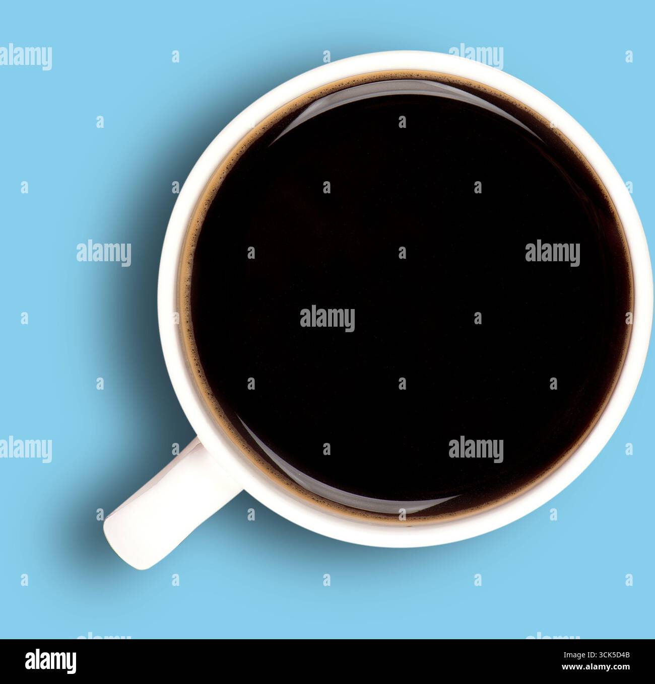 A top view of a cup filled with black coffee, emphasizing its rich ...