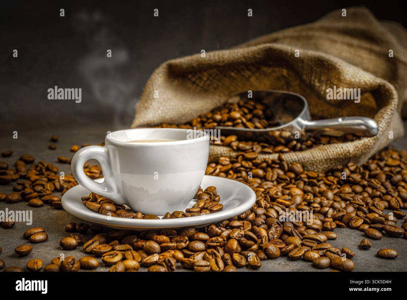 Steaming coffee cup beans hi-res stock photography and images - Alamy