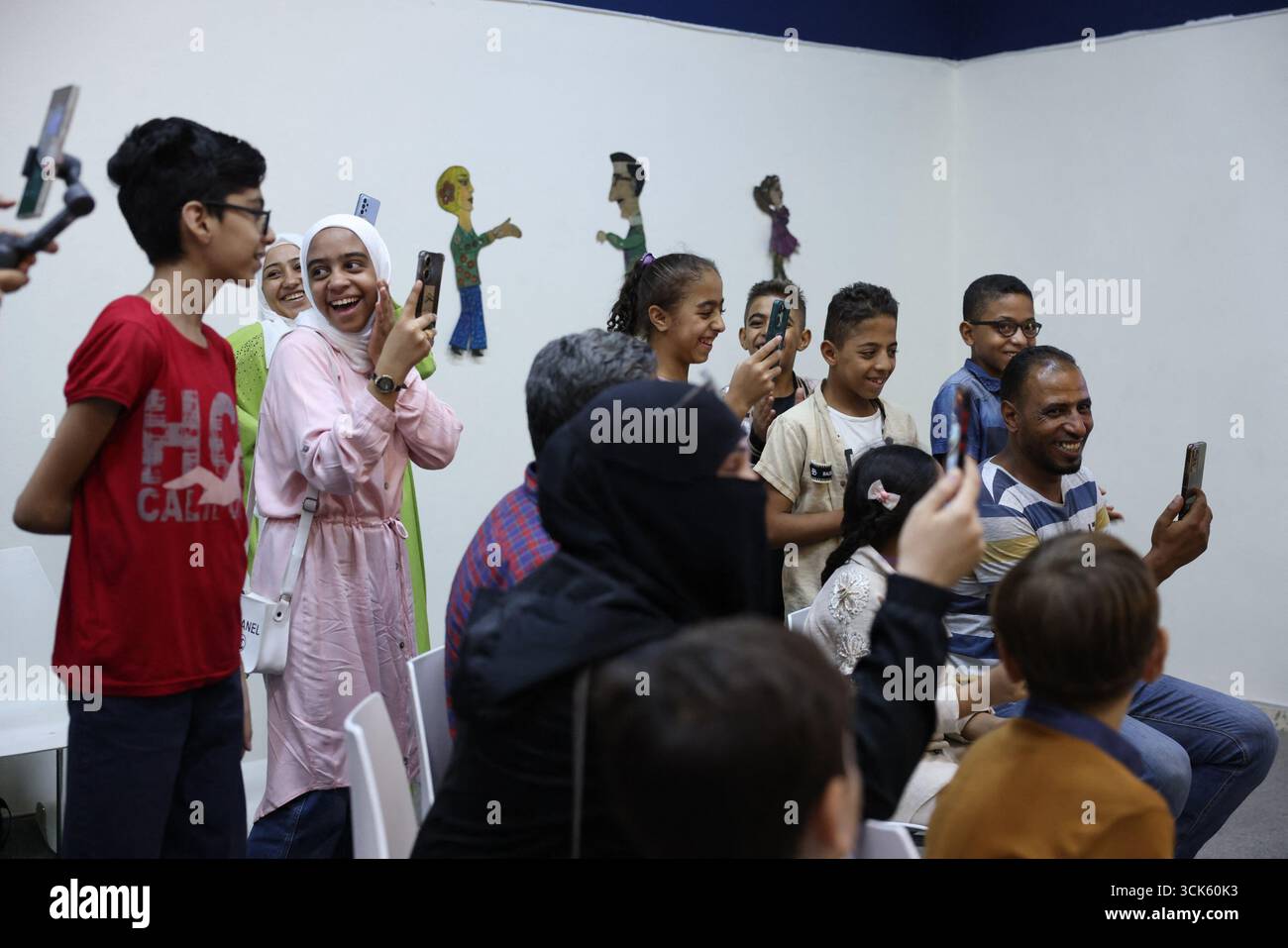 A Syrian puppeteer entertains children at the Damascus International ...