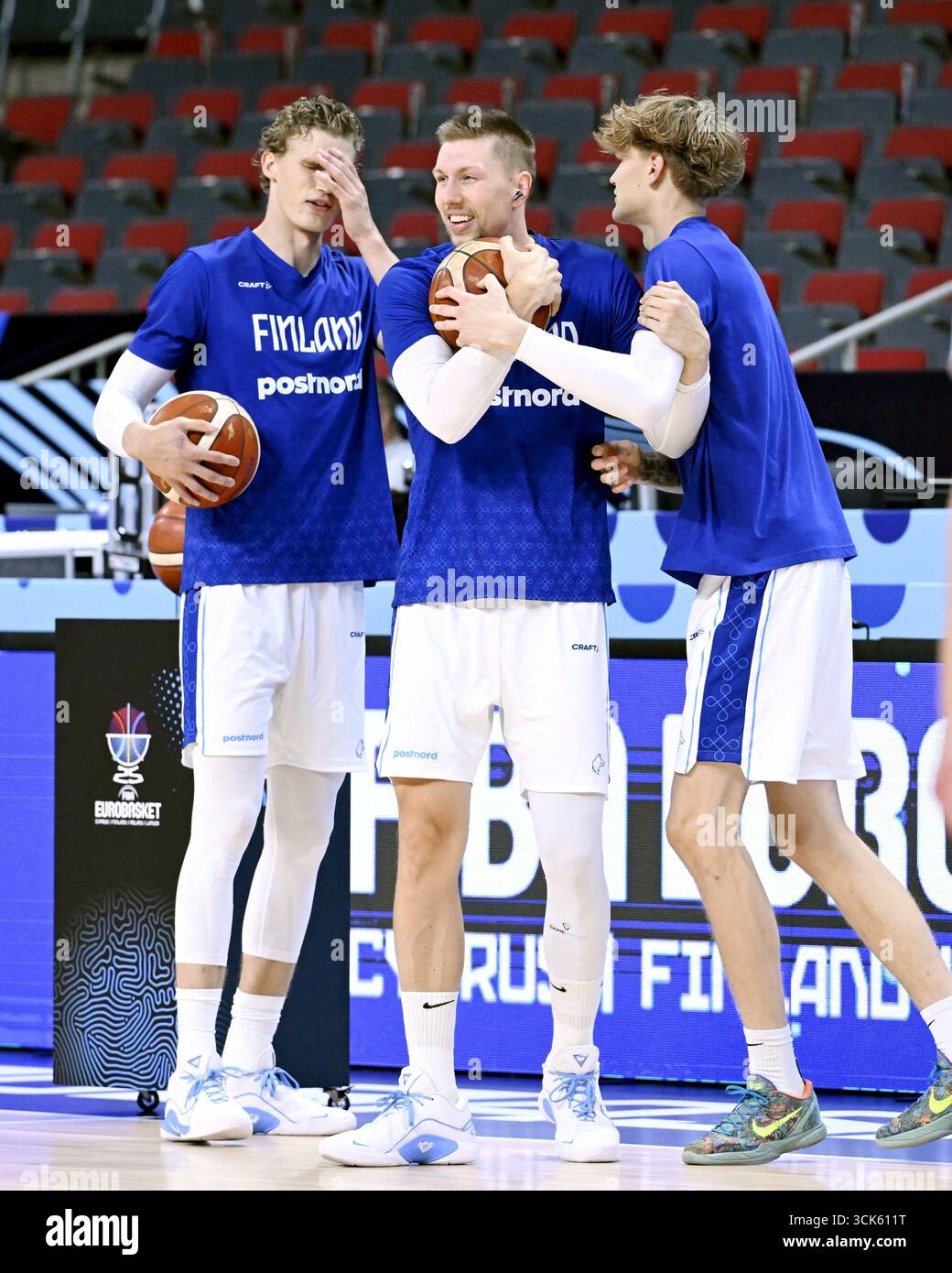 Finland's Lauri Markkanen (L to R), Alexander Madsen and Miikka ...