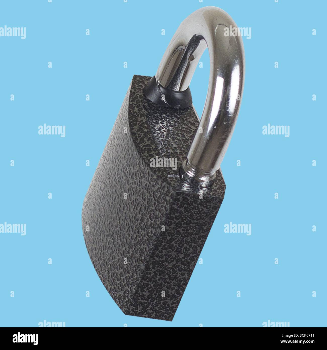 A metallic padlock with a textured surface, designed for securing items ...