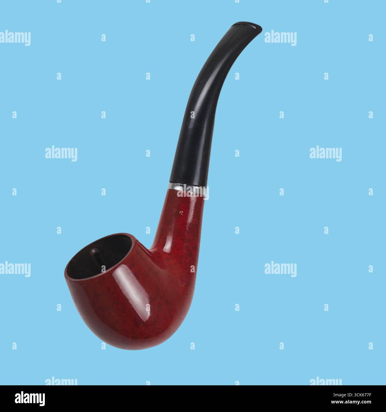 A classic smoking pipe with a curved design, typically used for tobacco ...