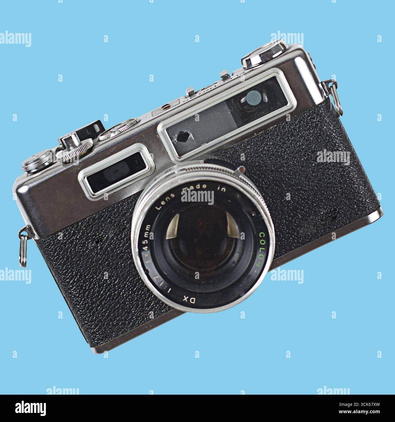 A vintage camera with a classic design, used for capturing photographs ...