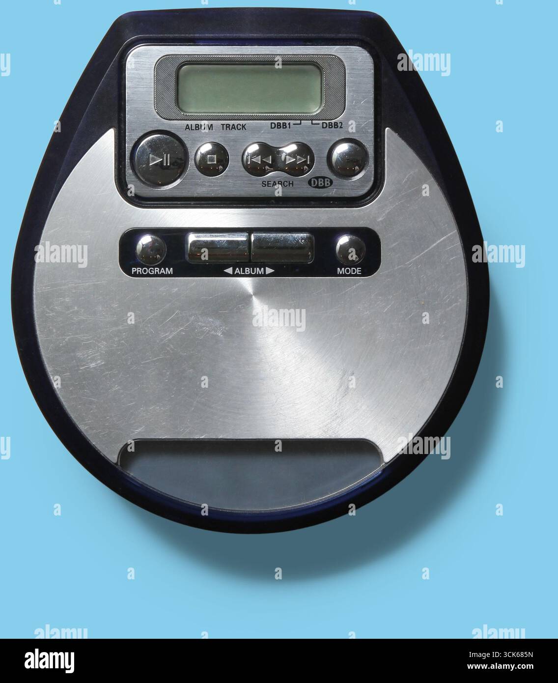 A portable CD player with a sleek design and control buttons for ...