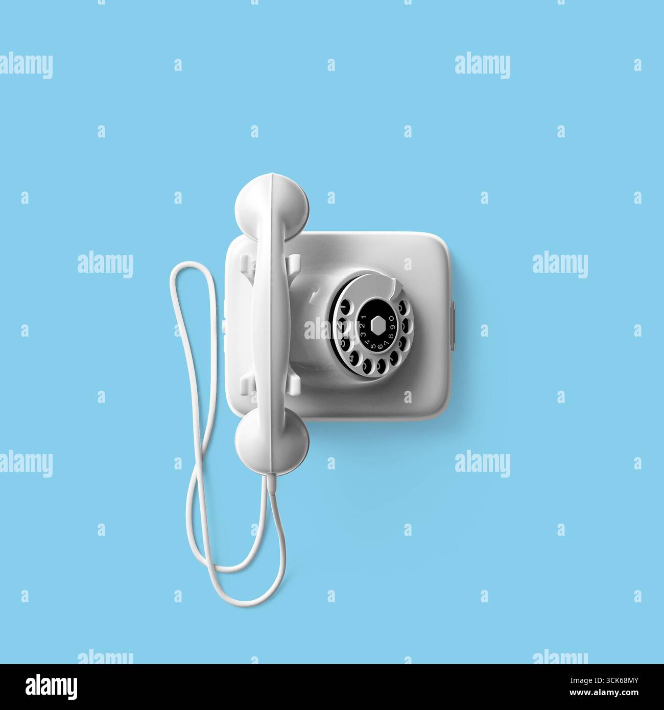 An old-fashioned rotary telephone in white, symbolizing vintage ...