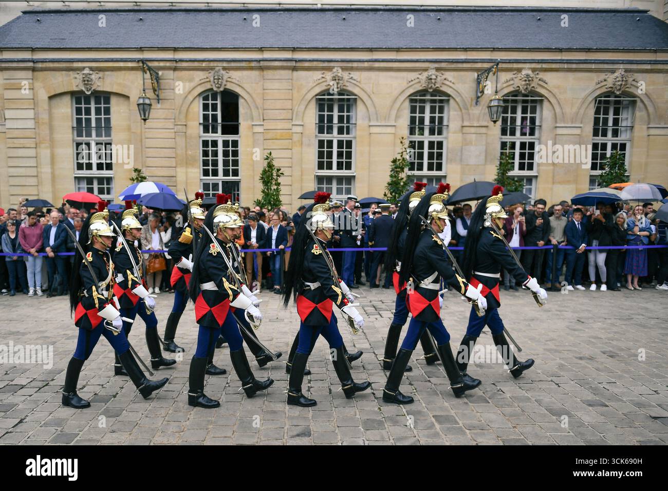 French Republican Guard arrive for a handover ceremony at the Hotel de ...