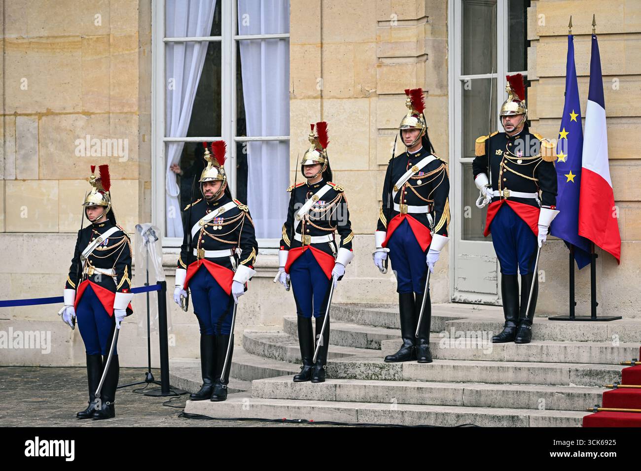 French Republican Guard stand in attention during a handover ceremony ...
