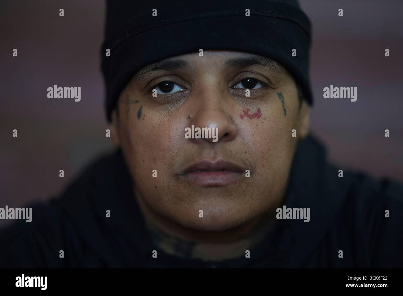 Maria Pires poses for a portrait at the shelter where she is staying in ...