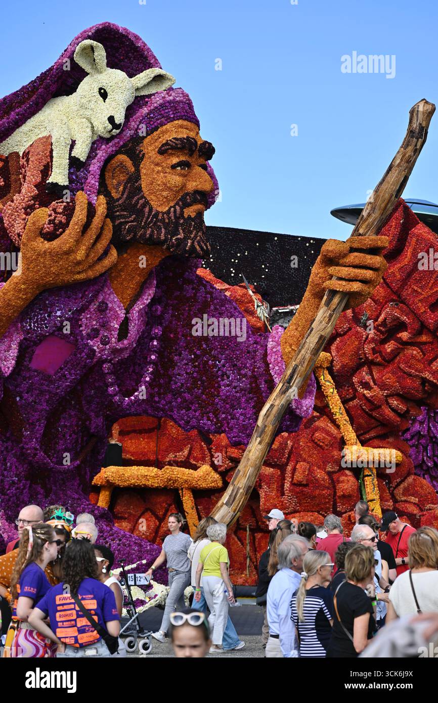 Details of a float depicting a nomad shepherd, carrying a lamb on his ...