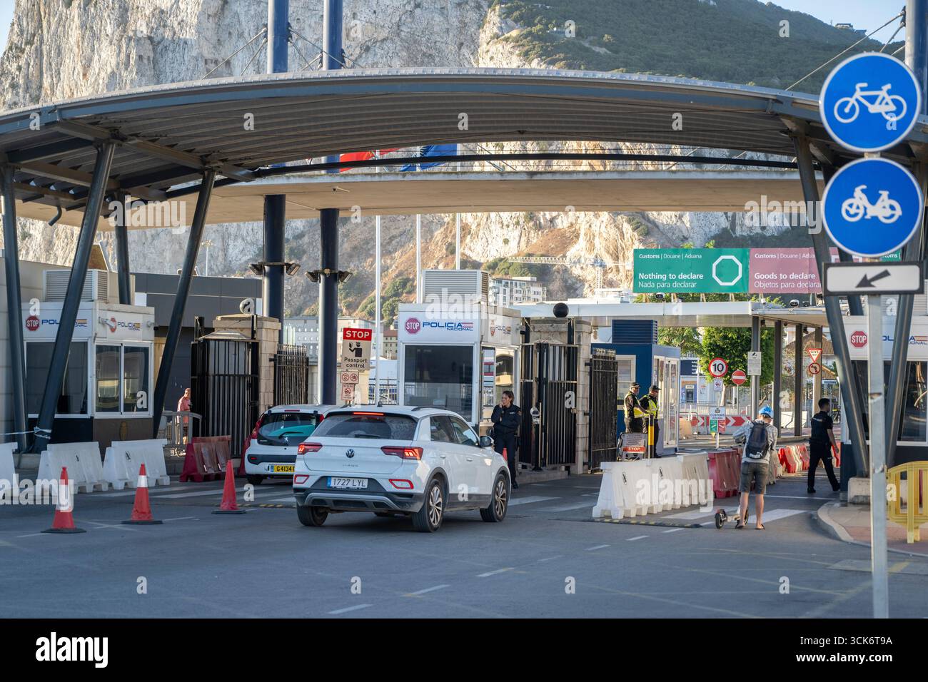 Vehicles enter Gibraltar at the border control point in La Linea de ...