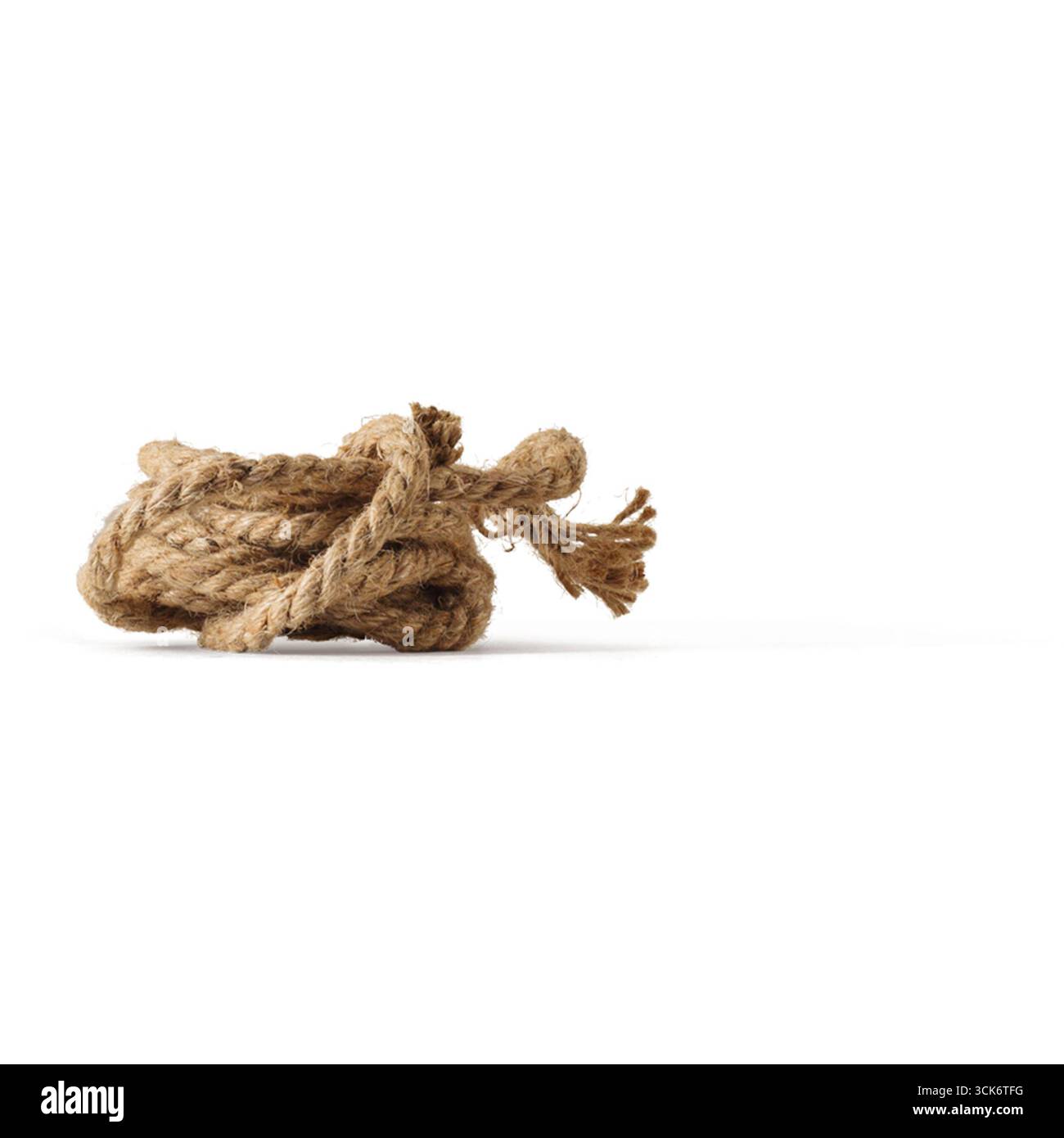 A coiled piece of natural rope, showcasing its texture and form Stock ...