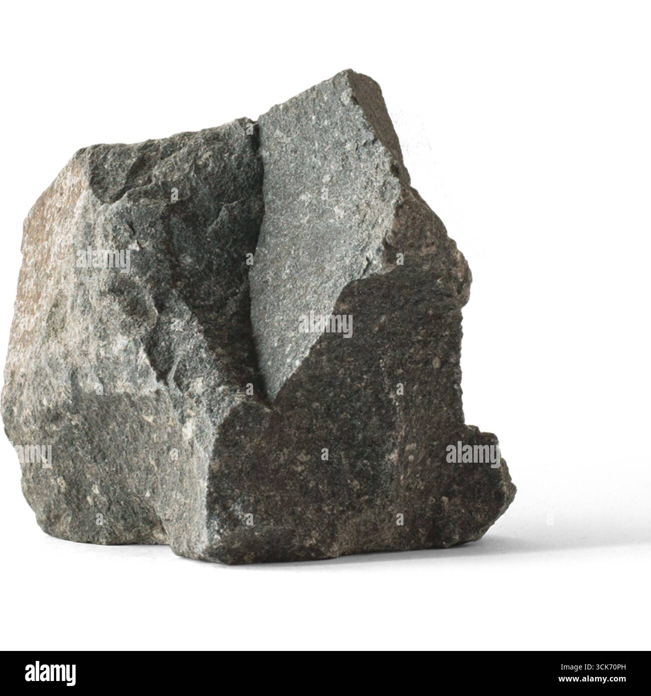A rough, natural rock with a textured surface, showcasing its ...