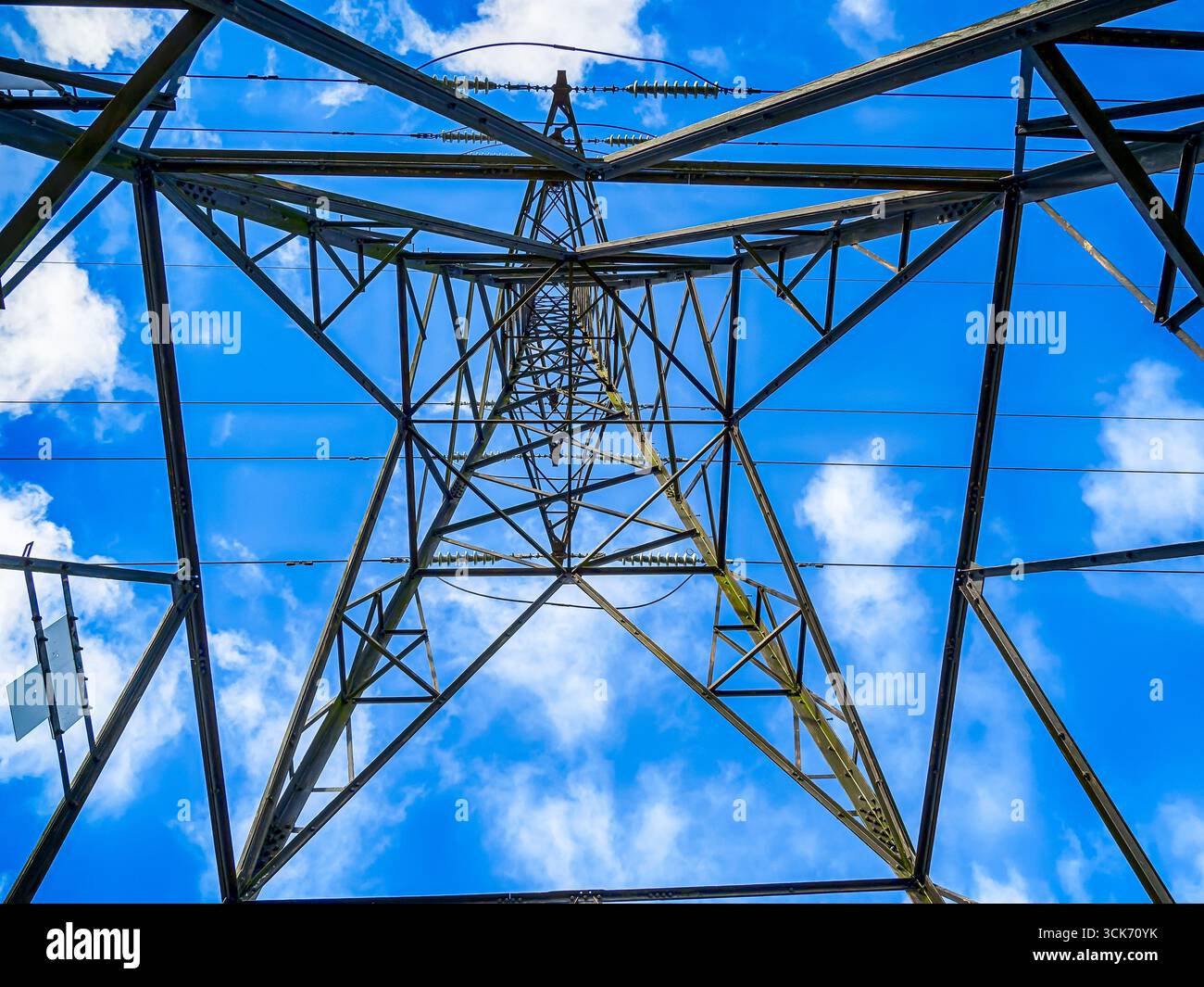 Geometric perspective looking upward through the metal framework of a ...