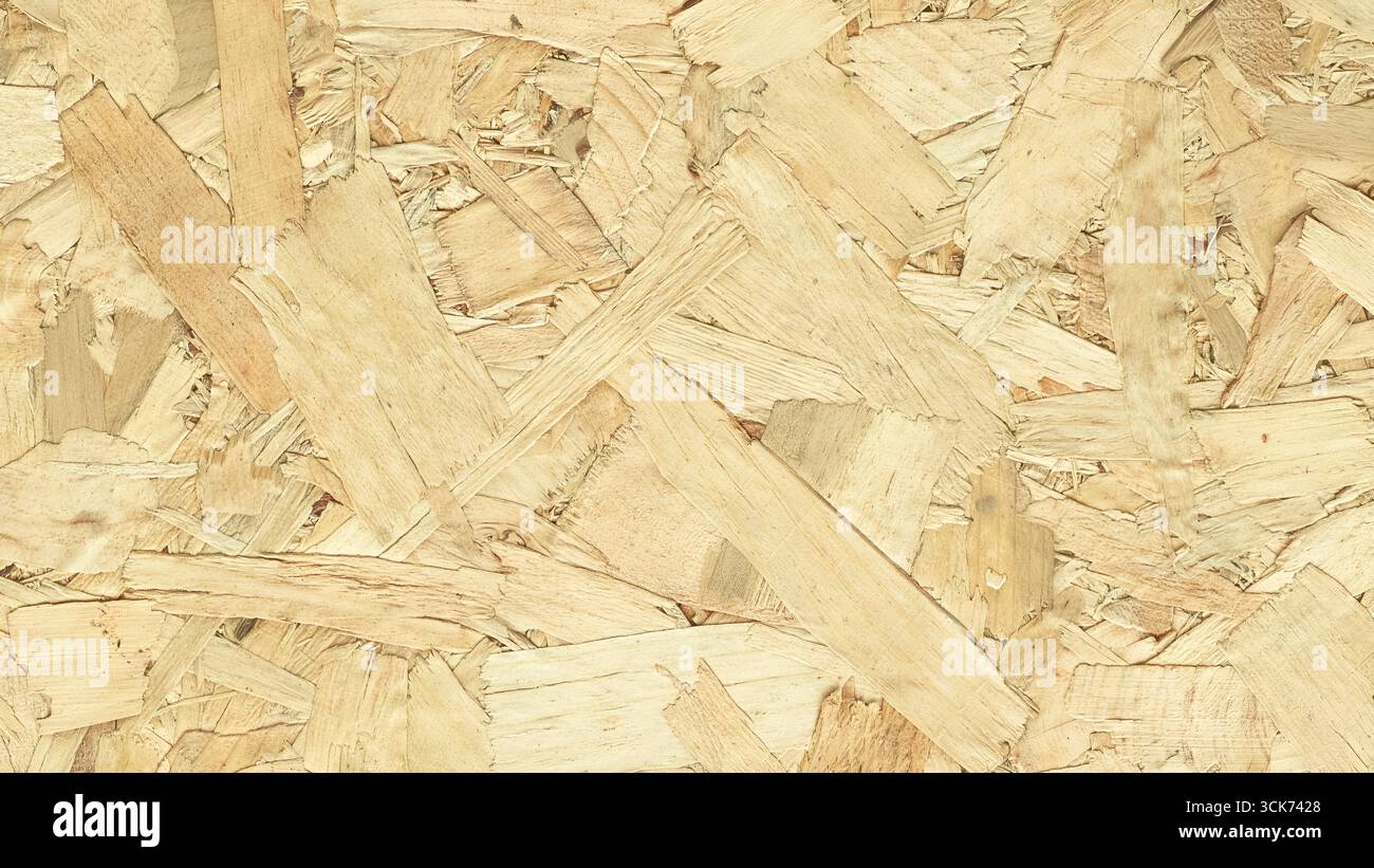 A close-up view of oriented strand board (OSB), showcasing its ...