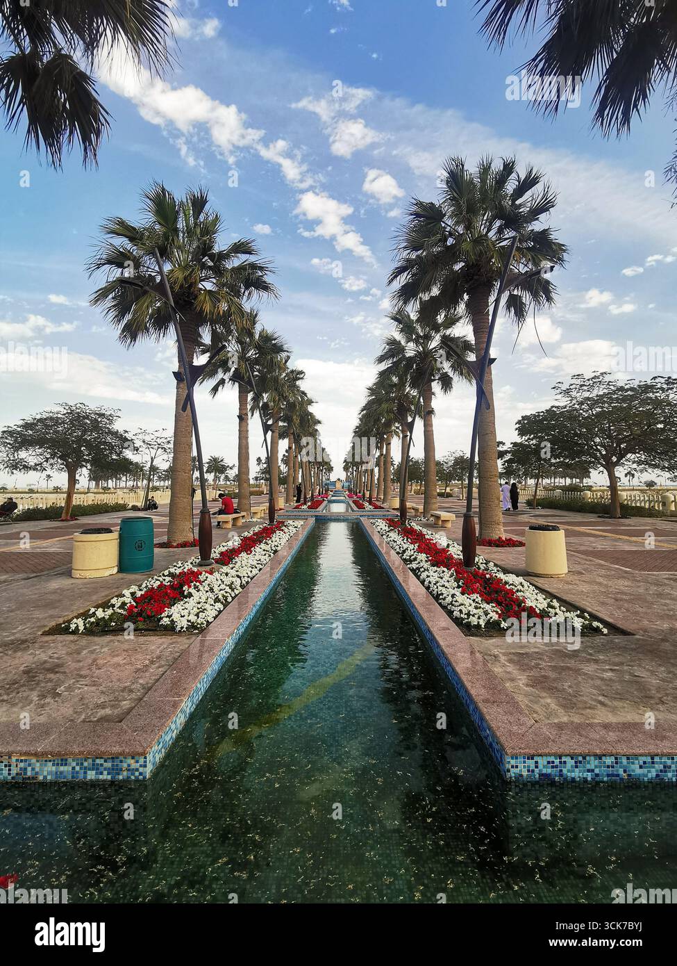 Al Khobar, Saudi Arabia – January 29, 2021: Palm trees and flower-lined ...