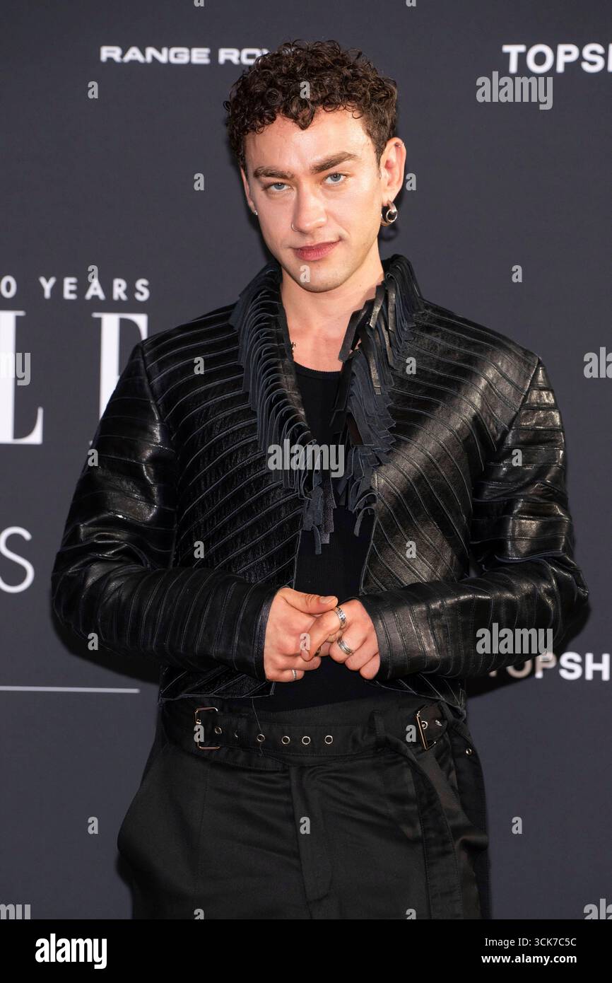 Olly Alexander poses for photographers upon arrival at the Elle Style ...