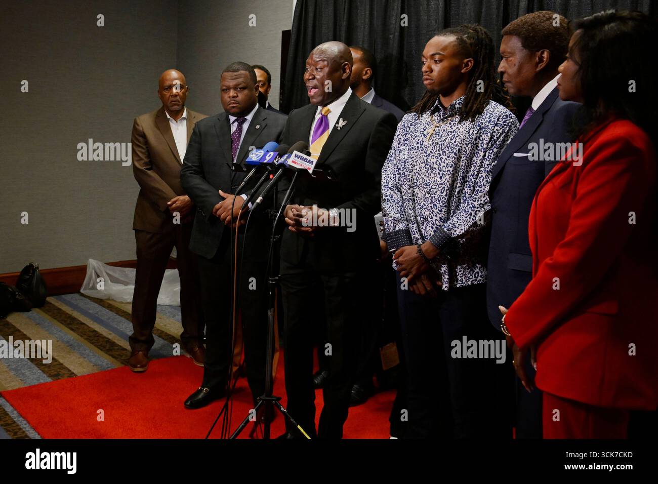 FILE - William McNeil Jr., third from right, looks on while his ...