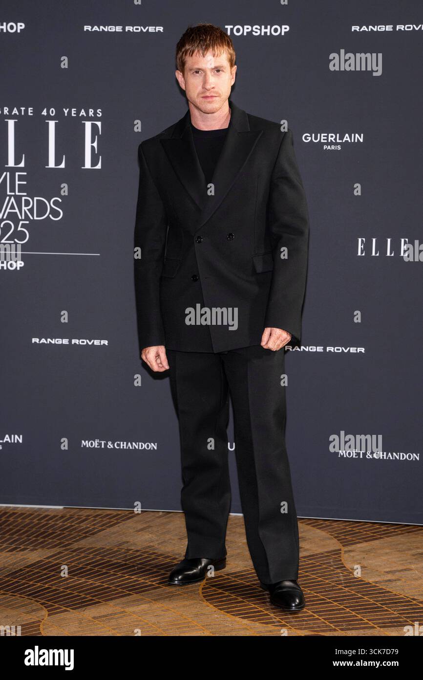 Daniel Lee poses for photographers upon arrival at the Elle Style ...