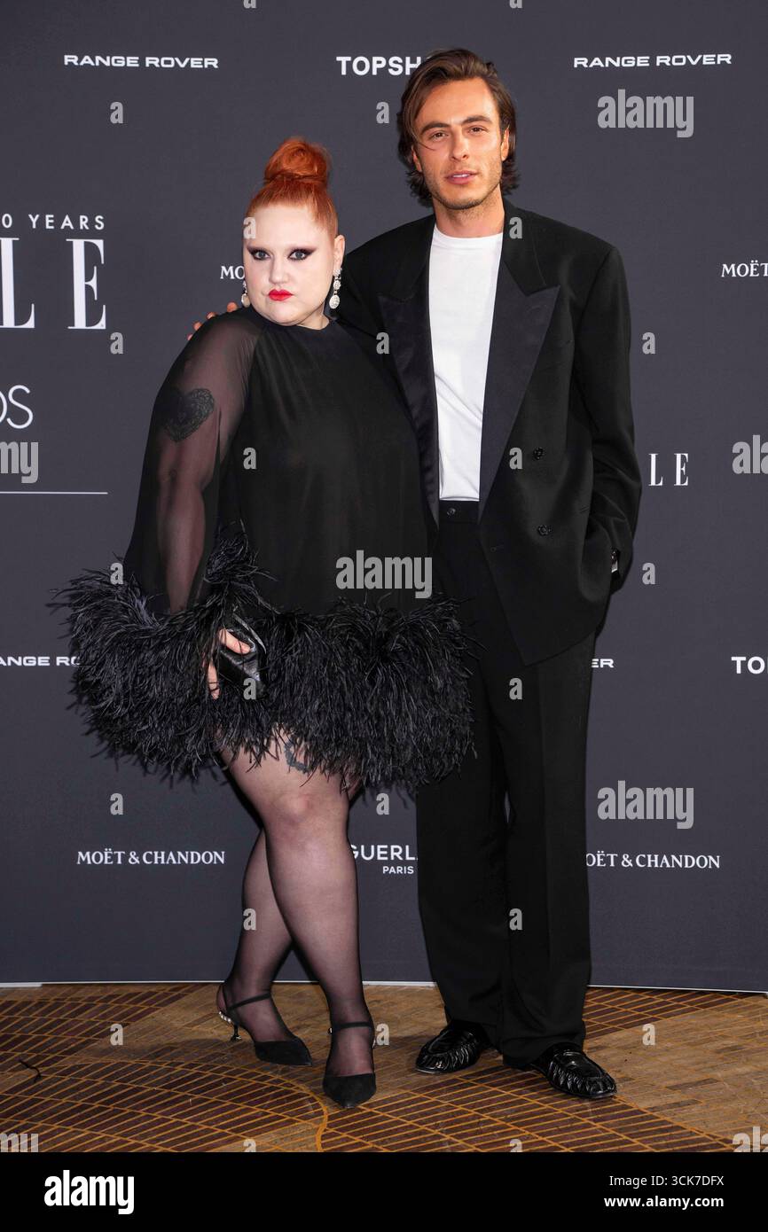 Beth Ditto, left, and Daniel Lee pose for photographers upon arrival at ...
