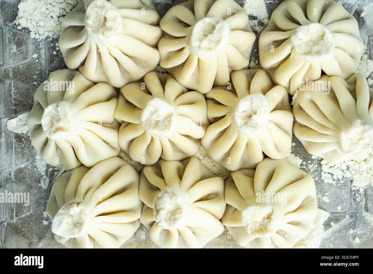 Traditional famous georgian khinkali dumplings on concrete background ...