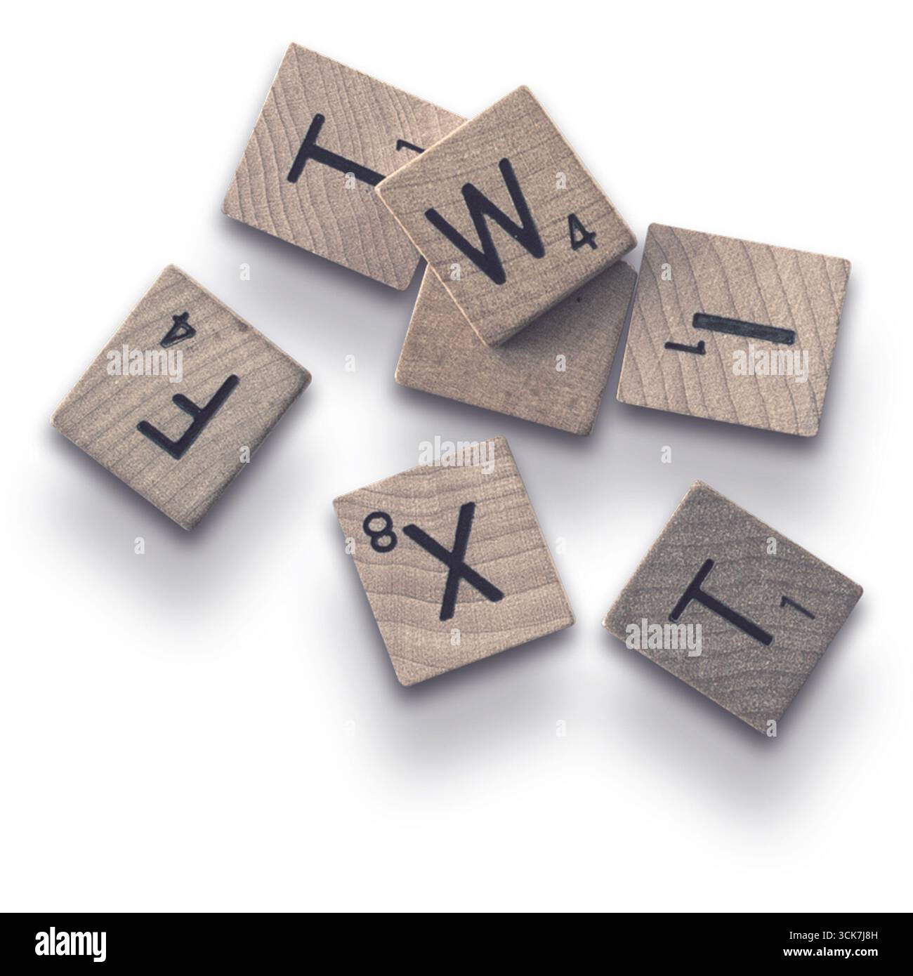 A collection of wooden letter tiles, likely for a word game, showcasing ...