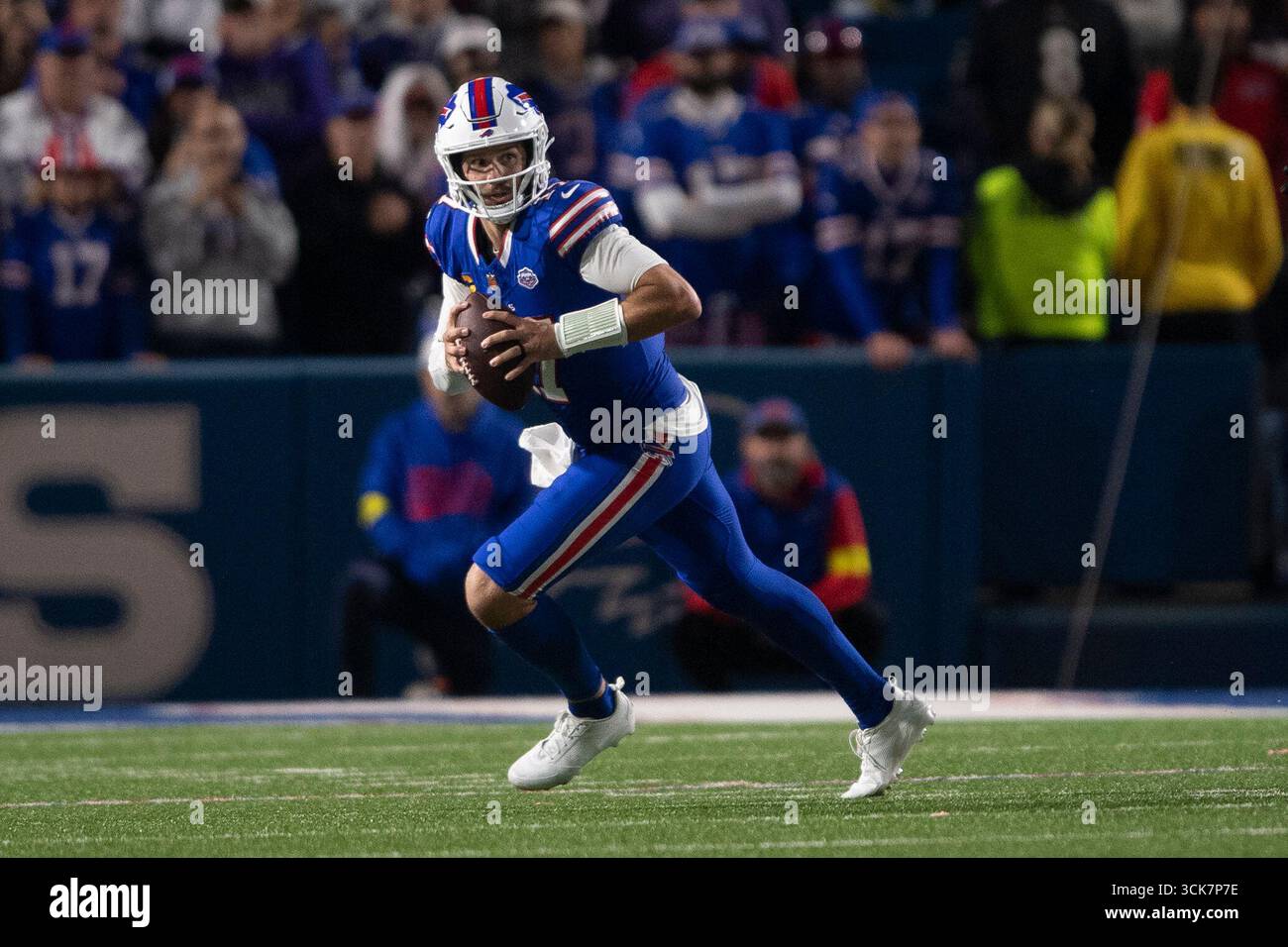 Buffalo Bills quarterback Josh Allen (17) runs with the ball during the ...