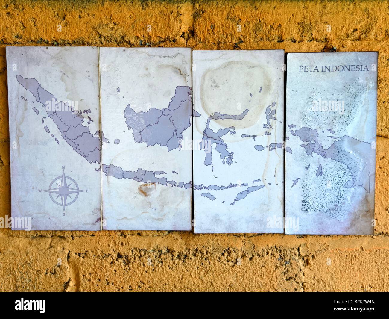 Vintage Map of Indonesia divided into four panels Displayed on a Rustic ...