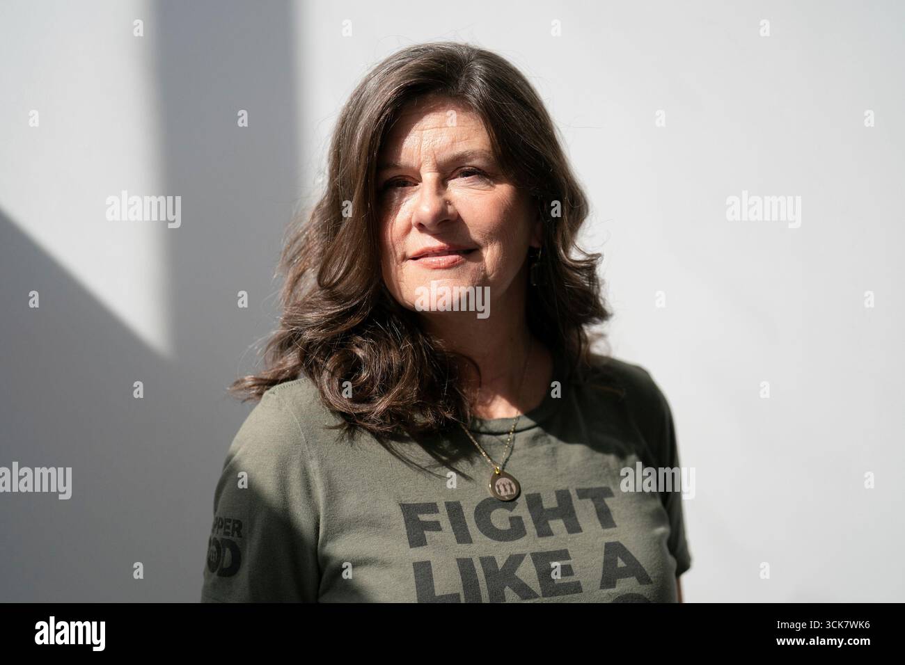 Real-life inspiration Sandra Perron of the film "Out Standing" poses ...