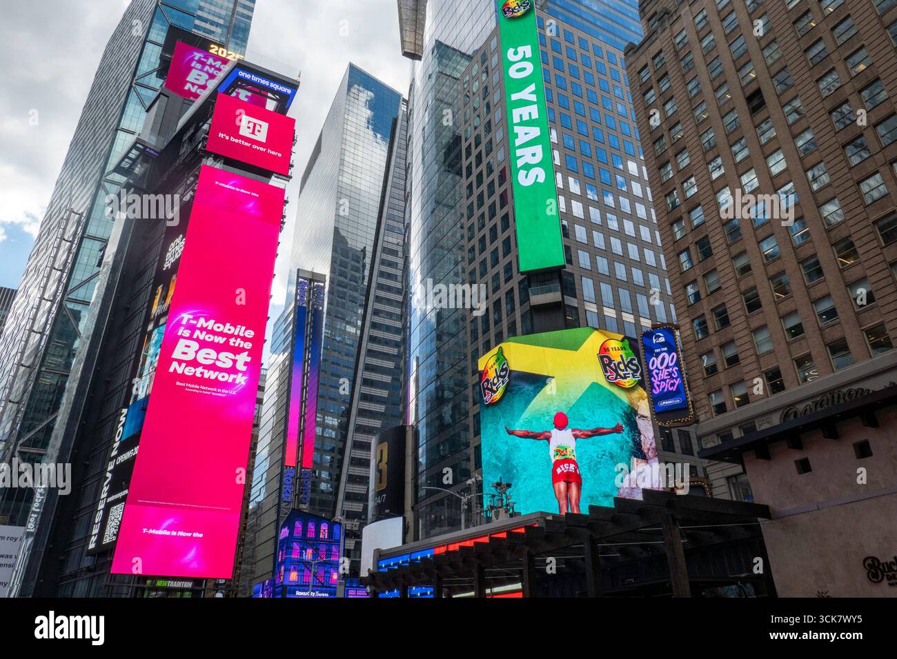 Times Square buildings are covered with bright electronic billboards 24 ...