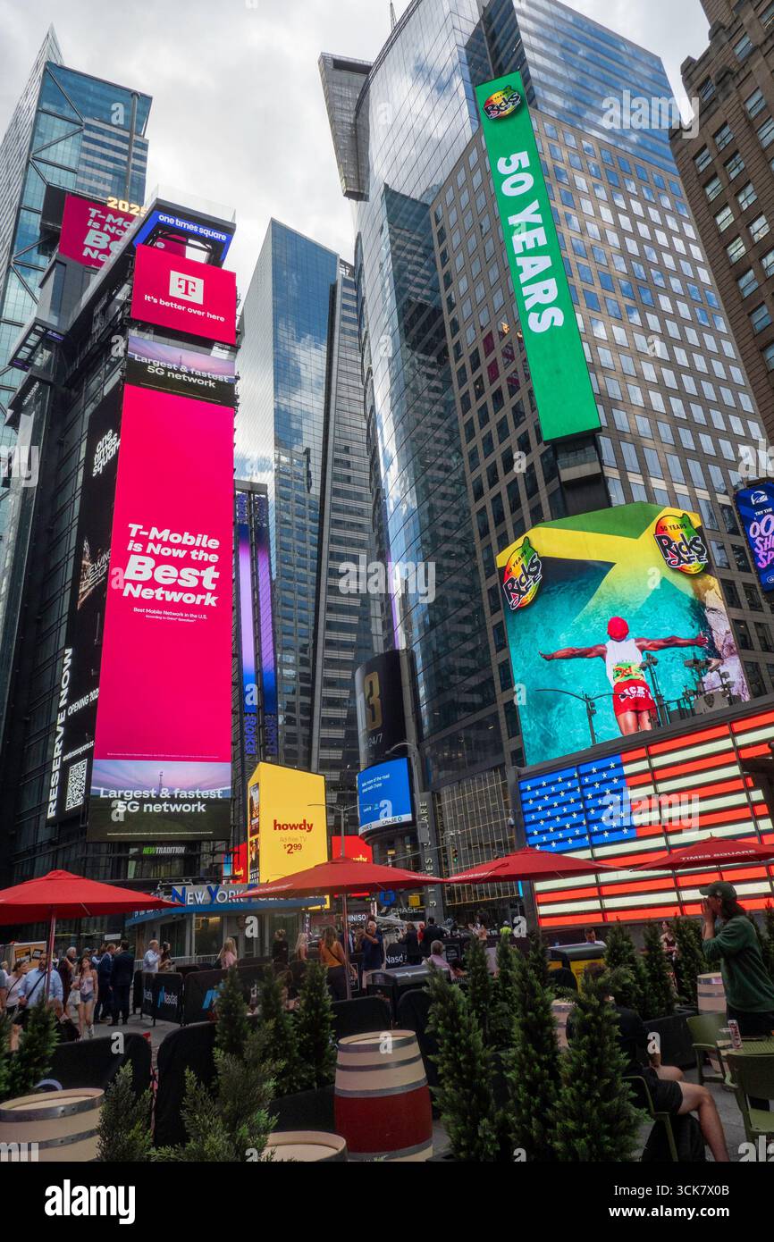 Times Square buildings are covered with bright electronic billboards 24 ...