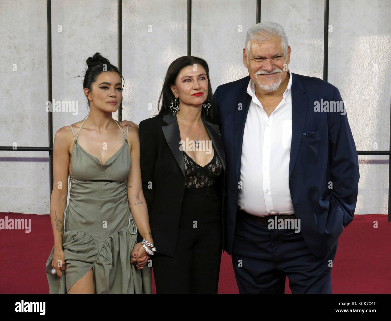 Mexican actors, from left, Paulina Gaitan, Leticia Huijara and Joaquin Cosio stand on the red ...