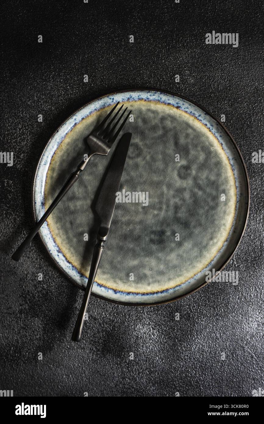 Grey ceramic plate on hi-res stock photography and images - Alamy