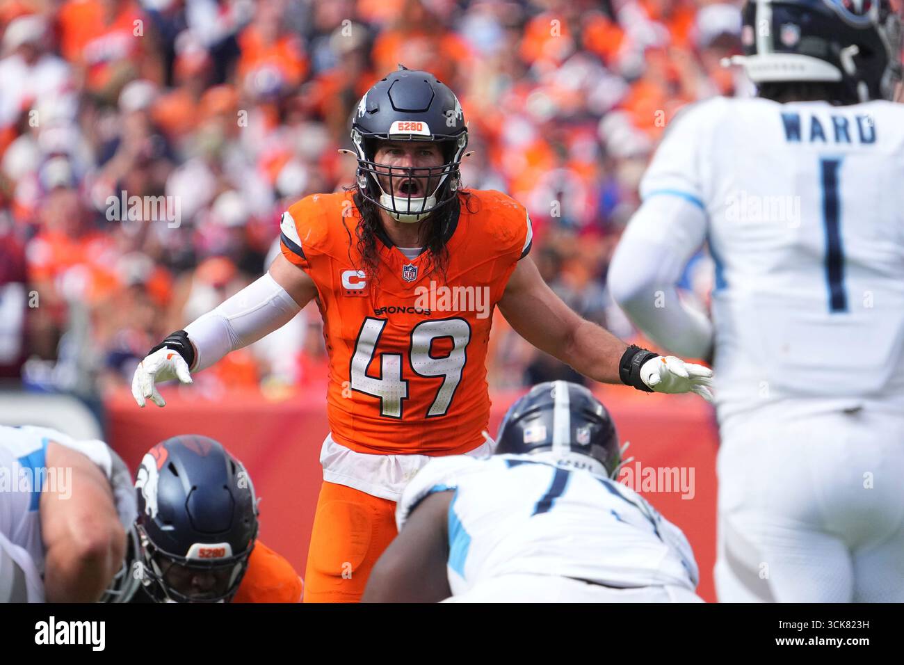 Denver Broncos linebacker Alex Singleton (49) runs a play against the ...