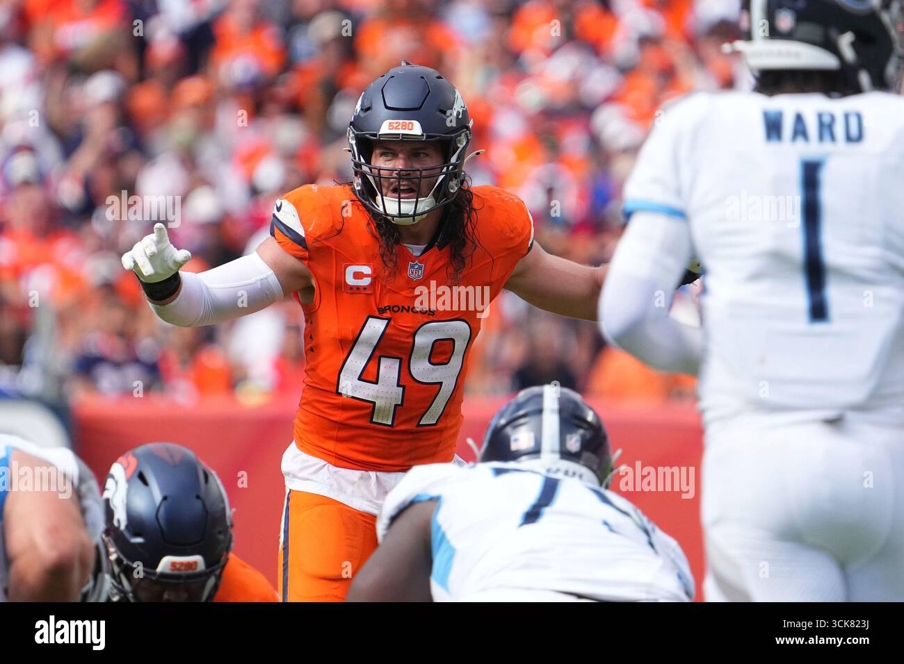 Denver Broncos linebacker Alex Singleton (49) runs a play against the ...