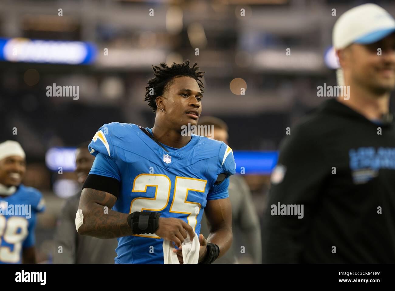 Los Angeles Chargers linebacker Junior Colson (25) walks back to the ...