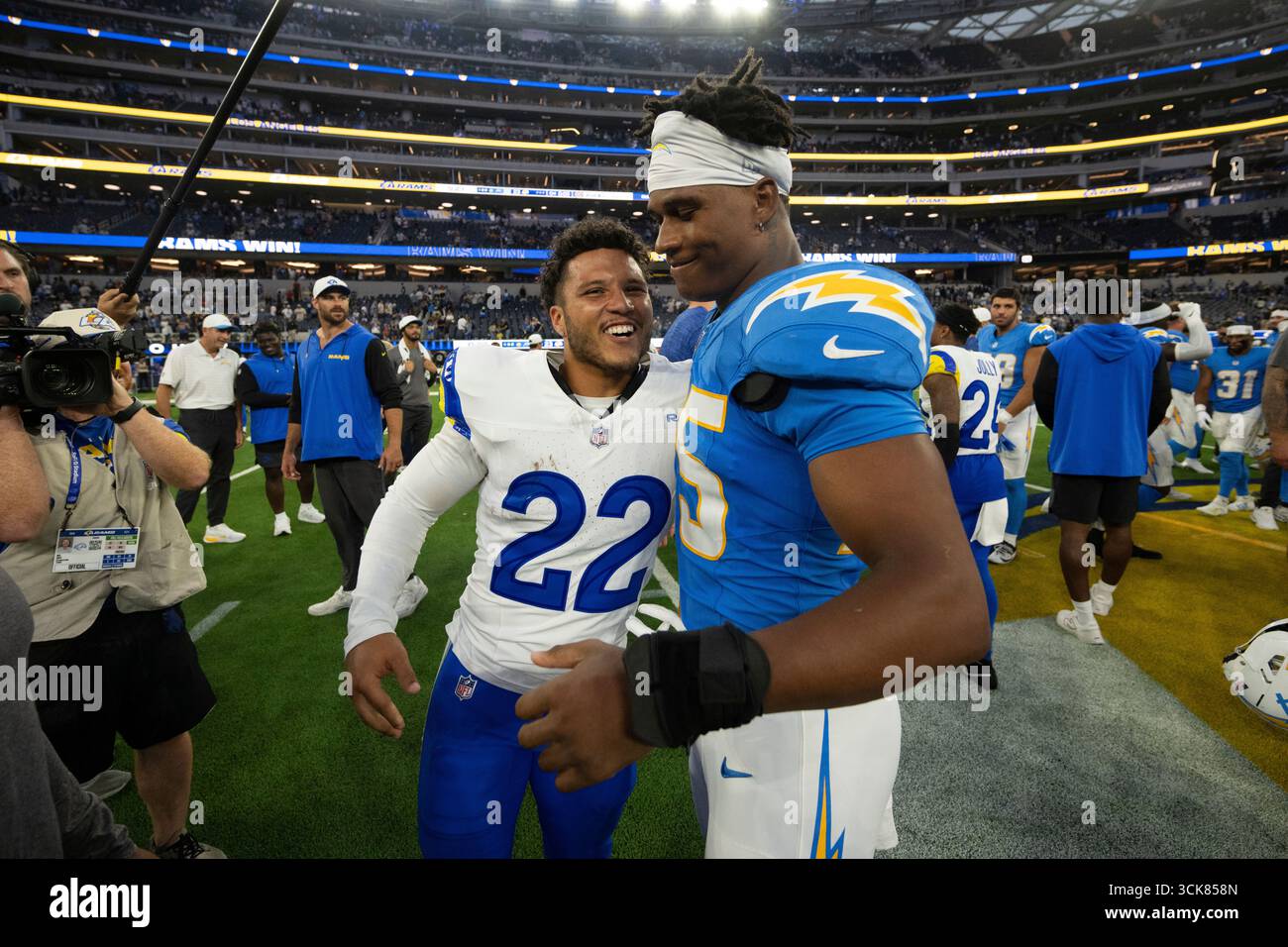 Los Angeles Rams running back Blake Corum (22), left, and Los Angeles ...