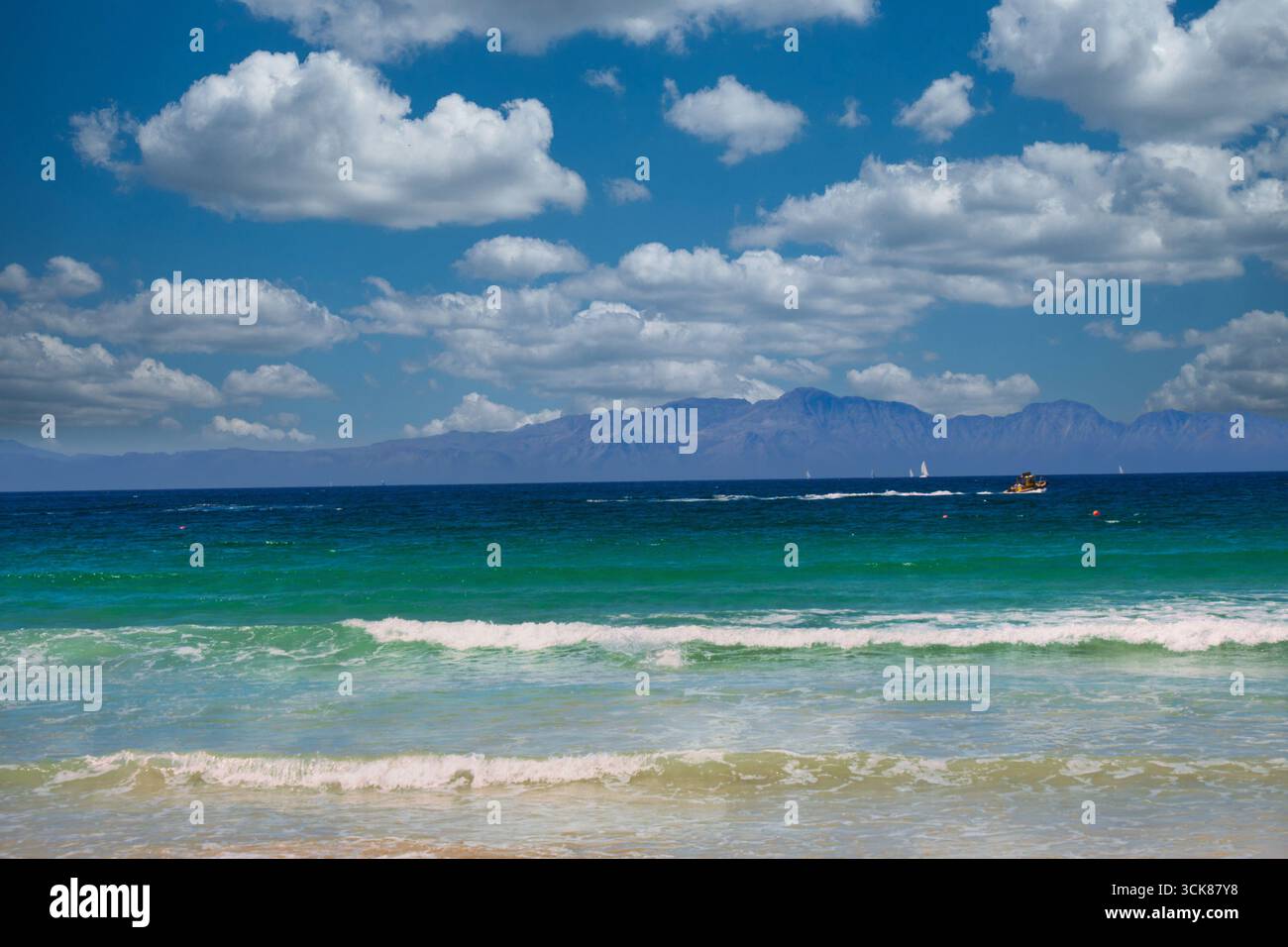 Atlantic ocean waves and mountain range in Cape Town South Africa, late ...