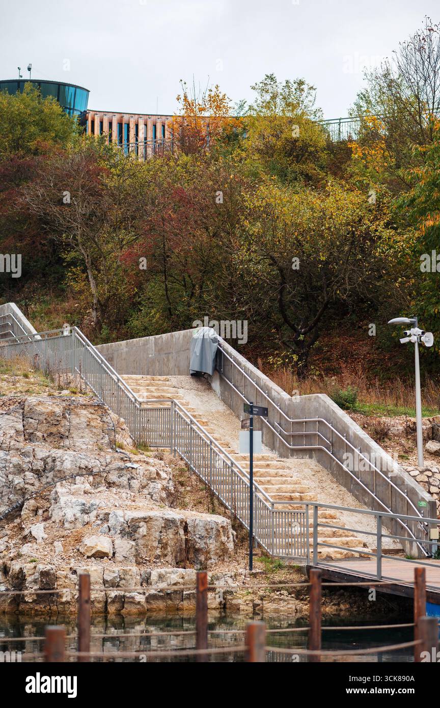 Outdoor staircase leading up a rocky hill with autumn foliage Stock ...