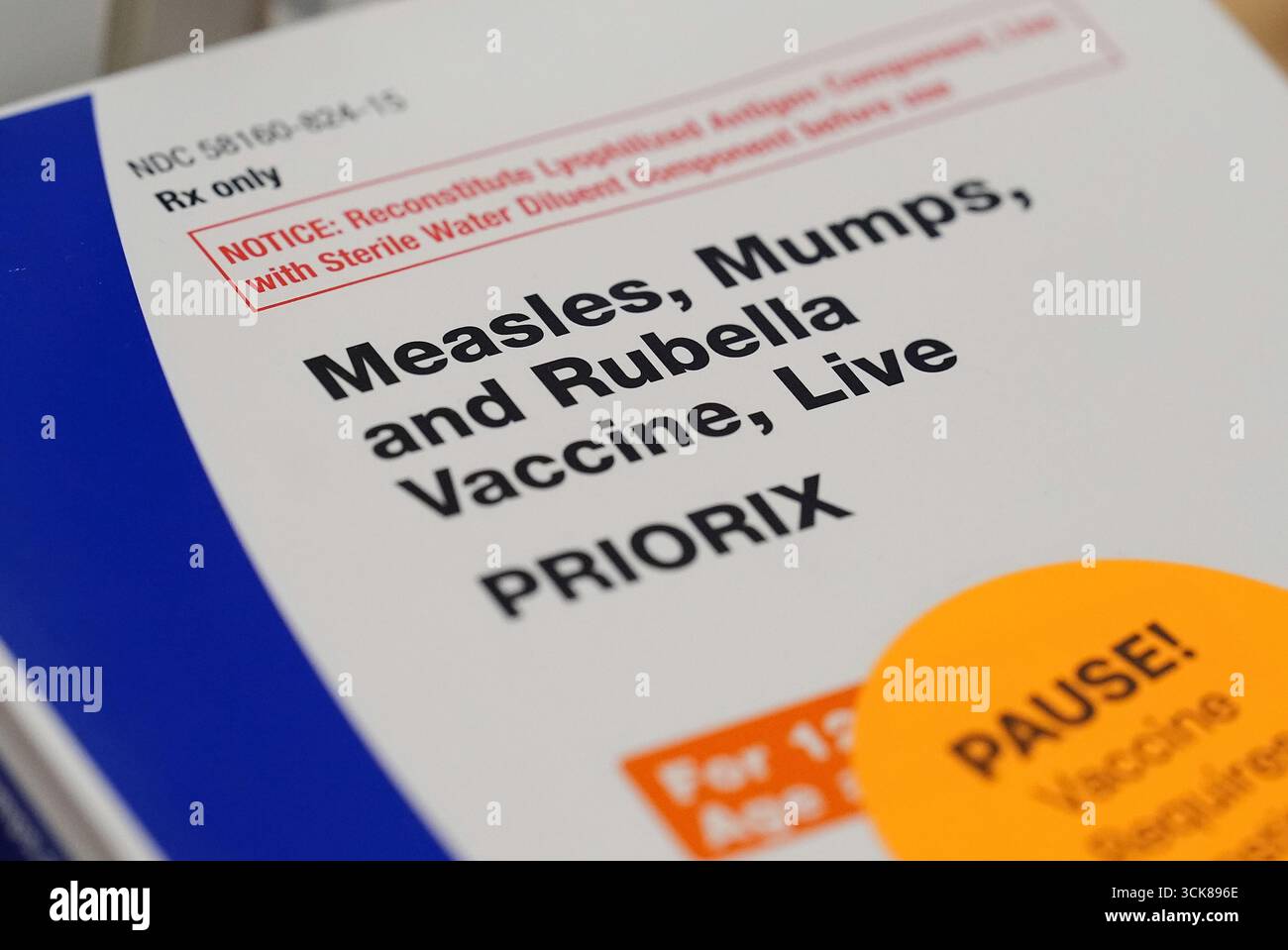 A box containing doses of the measles, mumps, and rubella vaccine (MMR ...