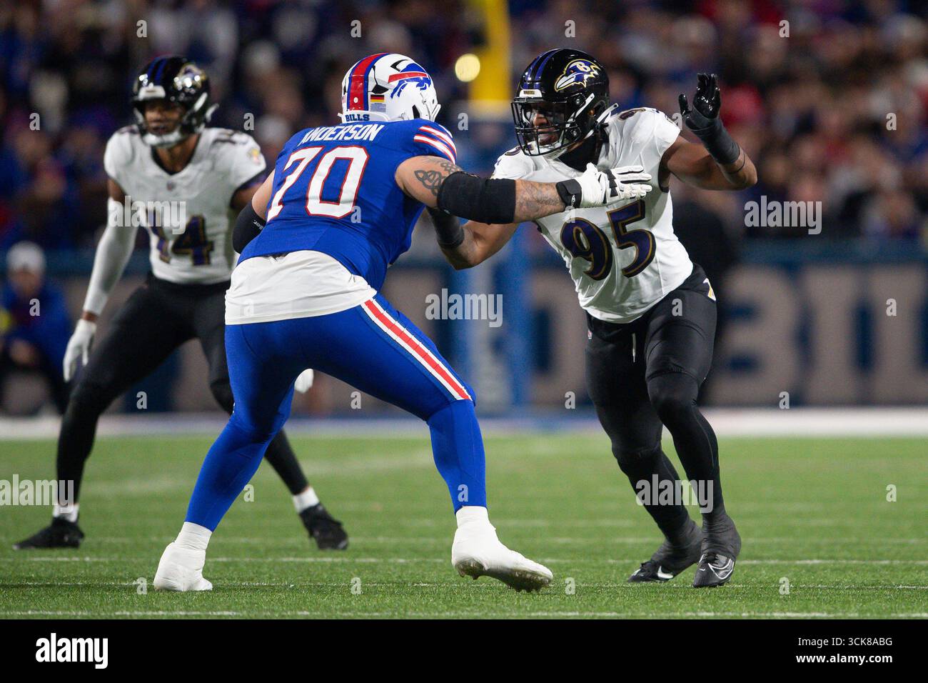 Baltimore Ravens linebacker Tavius Robinson (95) rushes against Buffalo ...