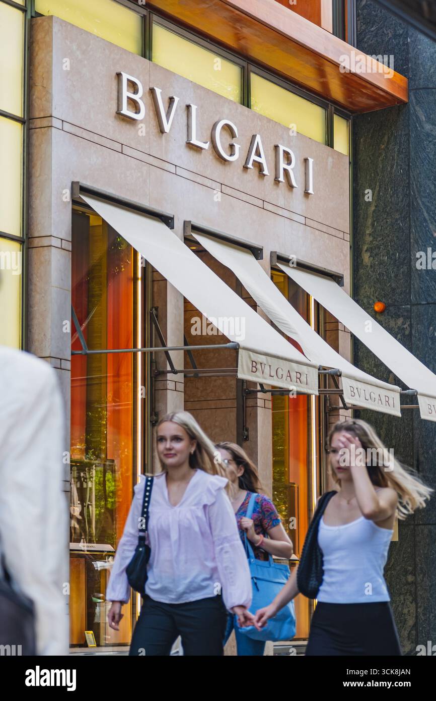 Bulgari luxury brand retail store with people passing by Stock Photo ...