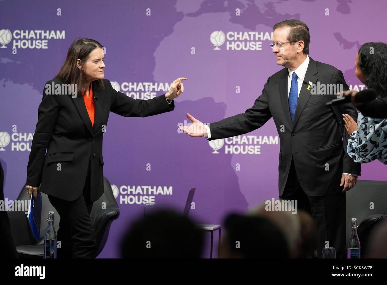 Israeli President Isaac Herzog leaves after taking part in an event ...