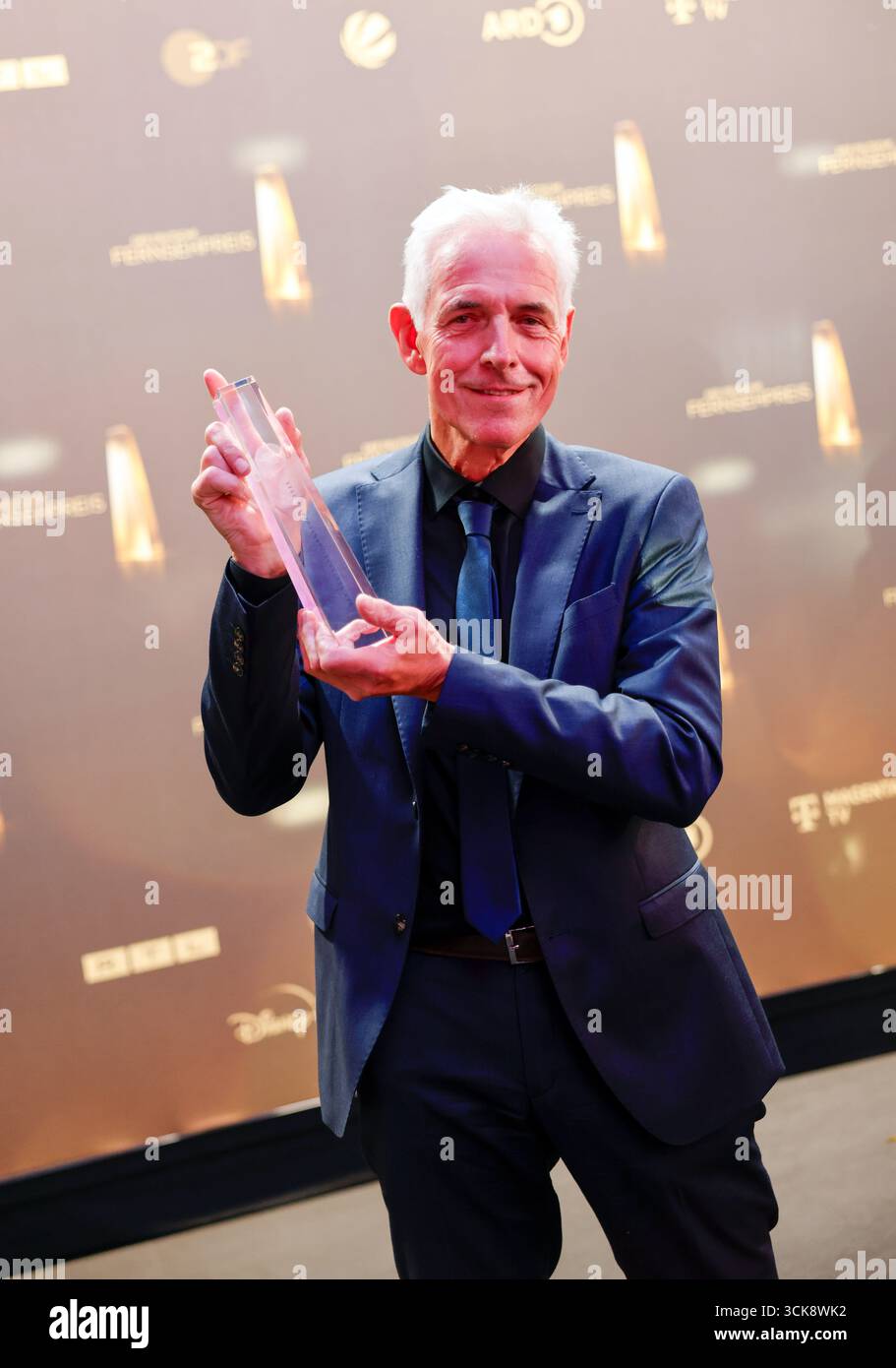 10 September 2025, North Rhine-Westphalia, Cologne: Reporter Burkhard ...